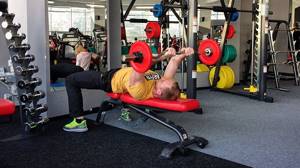 French bench press, standing and sitting: technique with barbell and ...